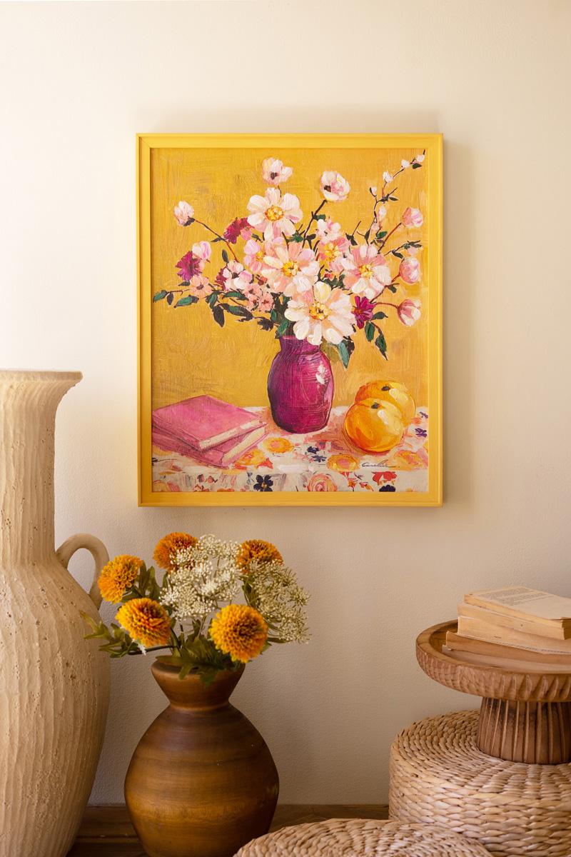 yellow framed still-life painting