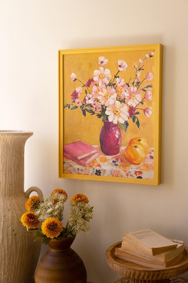 yellow framed still-life painting