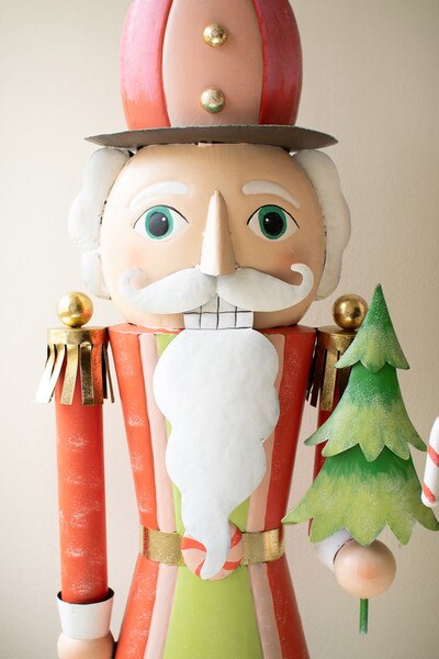 set of 2 life-sizepainted metal nutcrackers