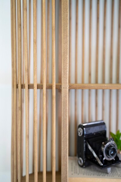 wood spindle oval wall shelf