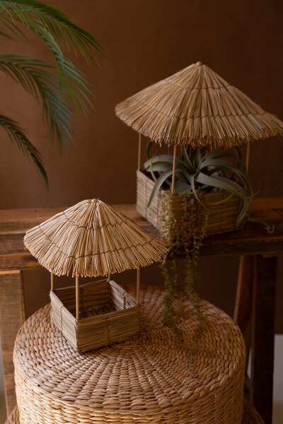 set of 2 seagrass and iron tiki hut planters