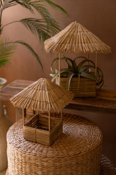 set of 2 seagrass and iron tiki hut planters