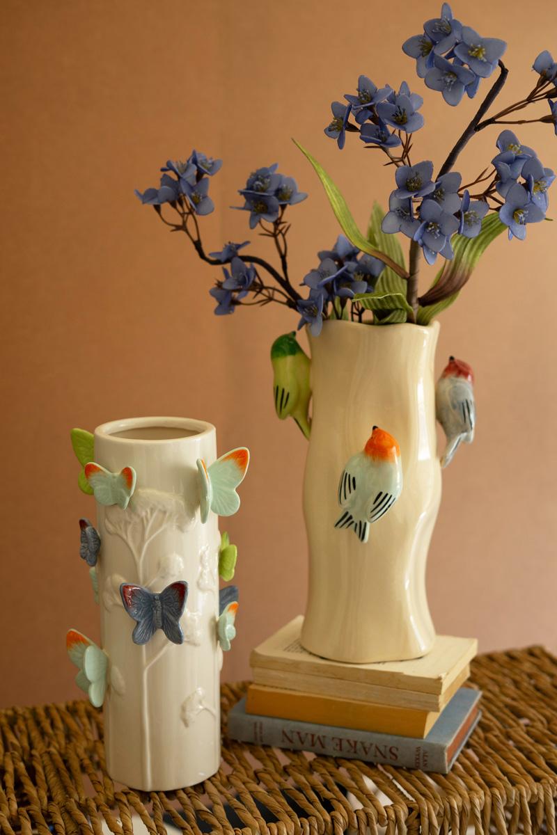 ceramic log vase with colorful birds
