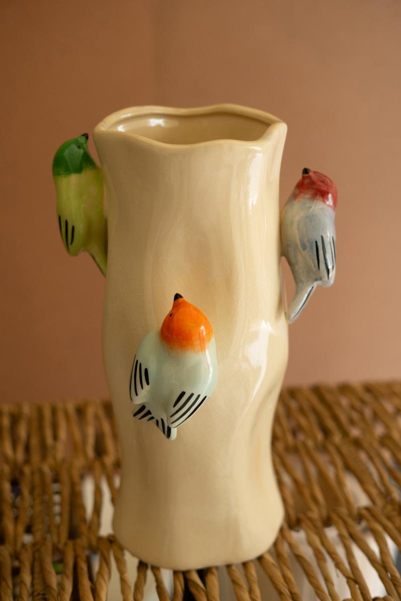 ceramic log vase with colorful birds