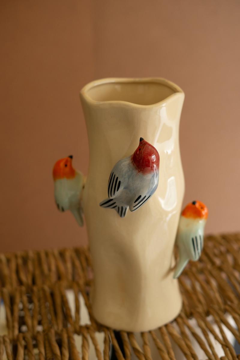 ceramic log vase with colorful birds