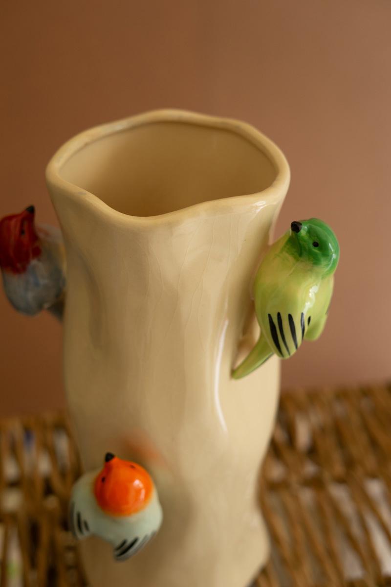ceramic log vase with colorful birds