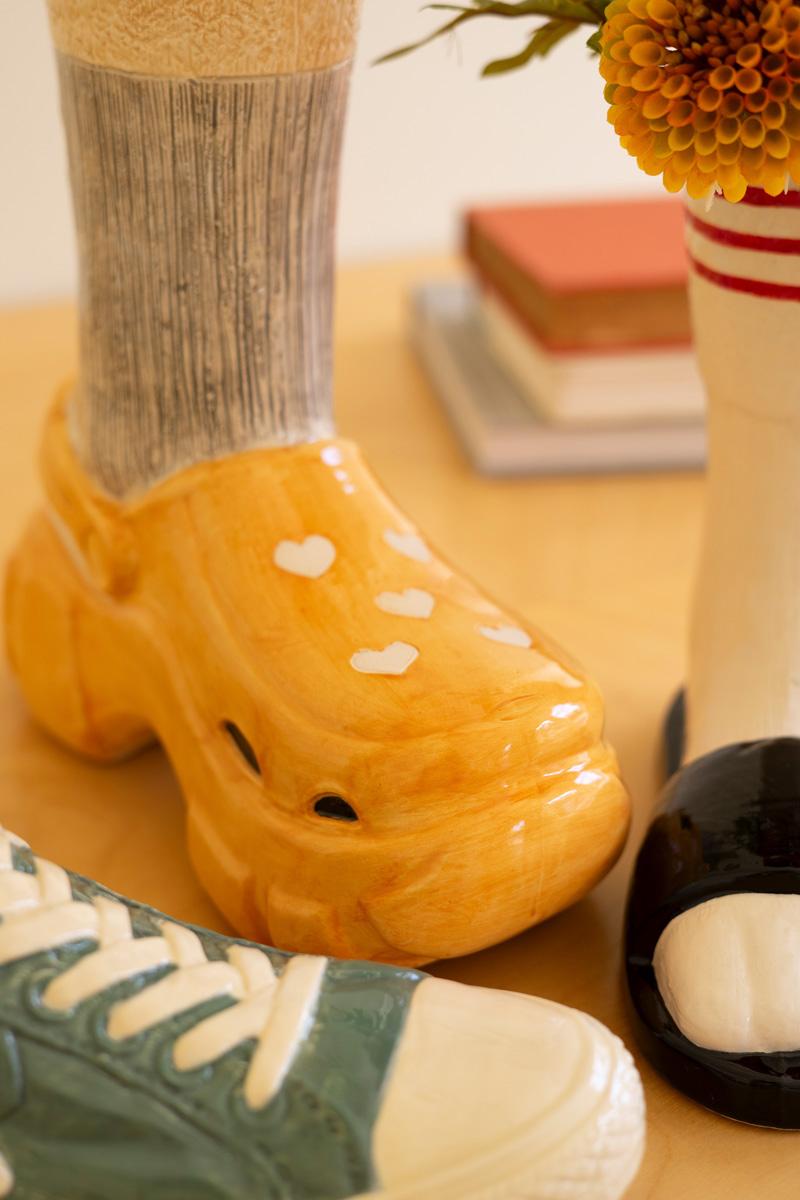 ceramic crocs and socks vase