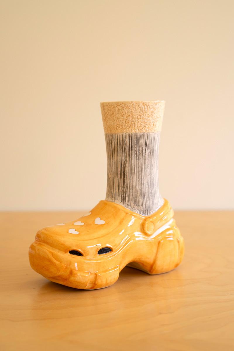 ceramic crocs and socks vase