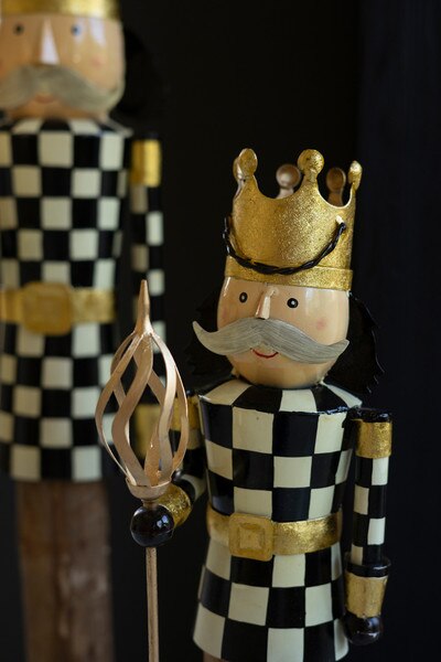 set of 2 painted metal and wood checkerboard nutcrackers