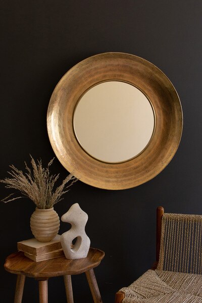round hand hammered antique brass framed mirror