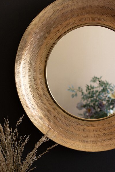 round hand hammered antique brass framed mirror