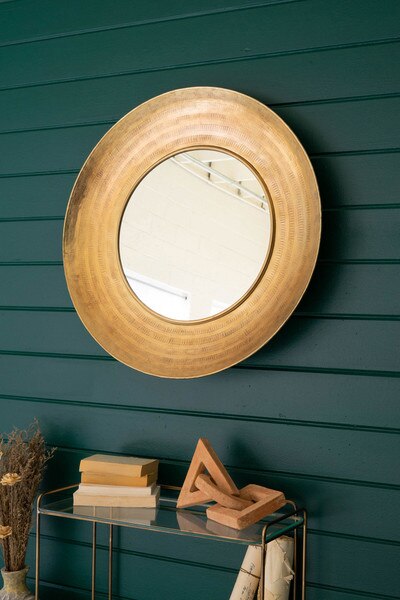 round hand hammered antique brass framed mirror